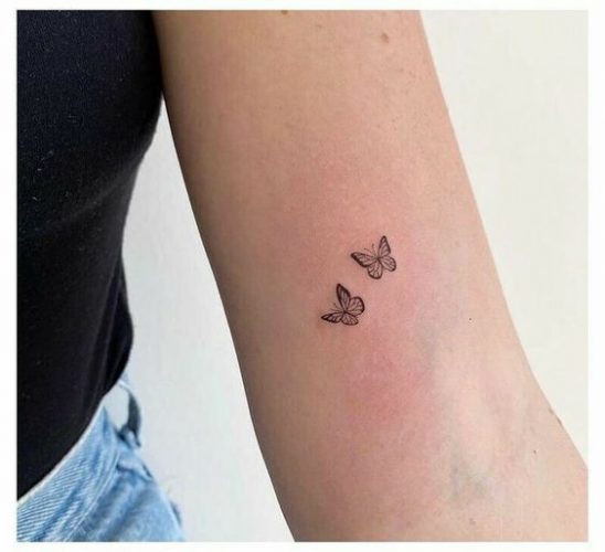 Tatouage Papillon Minimaliste